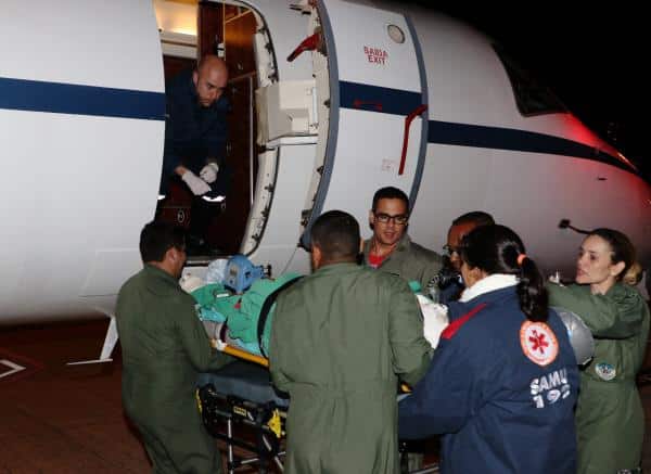 Victims of boat explosion are transported by Air Force plane