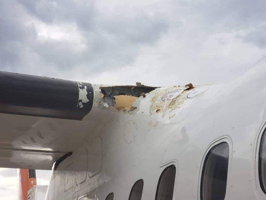 Turboprop lands with several damages after going through a hail storm ...